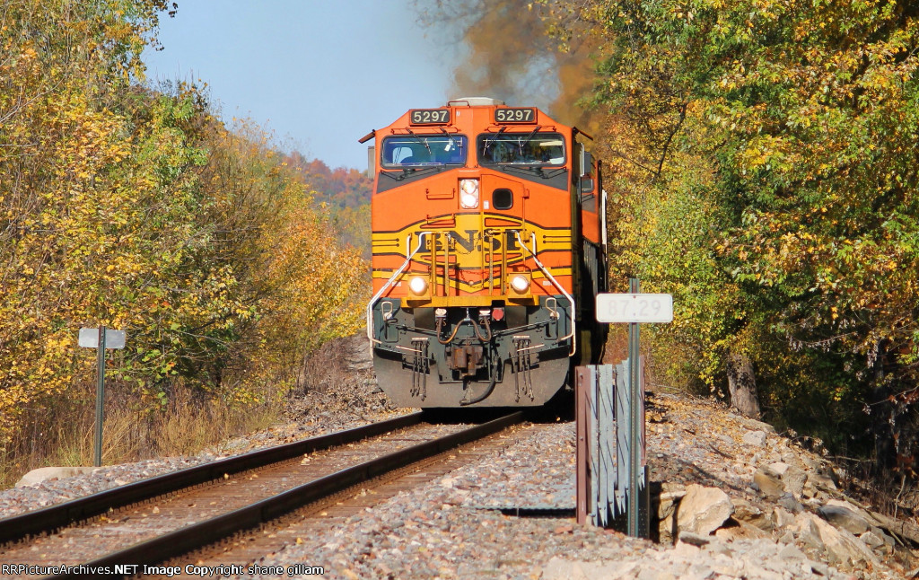 BNSF 5297 leads a mixed freight sb.